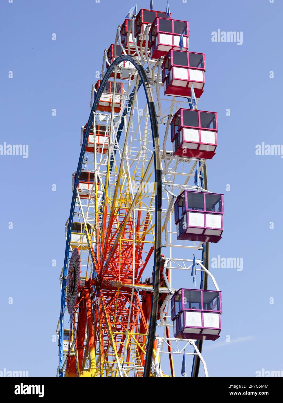 colorful booths and fun rides at a fairground Stock Photo - Alamy