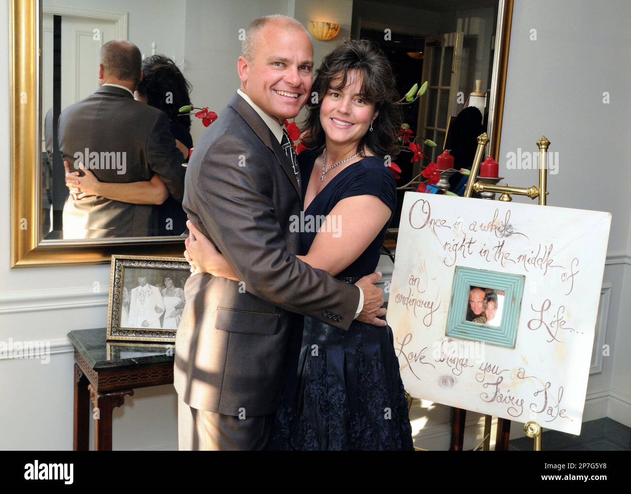 In this photo taken May 22, in Godfrey, Ill., Newlyweds Greg VanWyk and ...