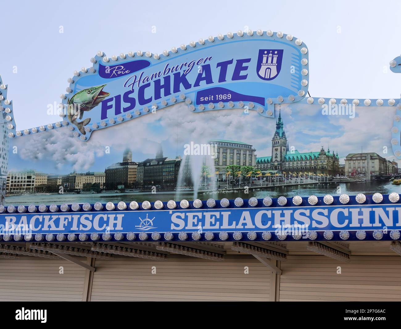 colorful booths and fun rides at a fairground Stock Photo - Alamy