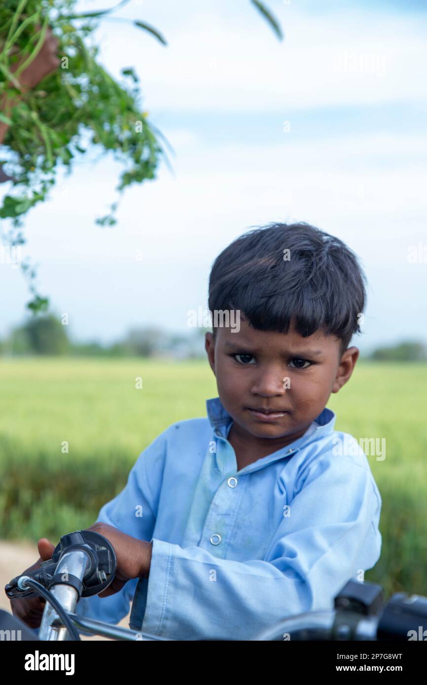 Portrait of a young boys in Village Stock Photo - Alamy