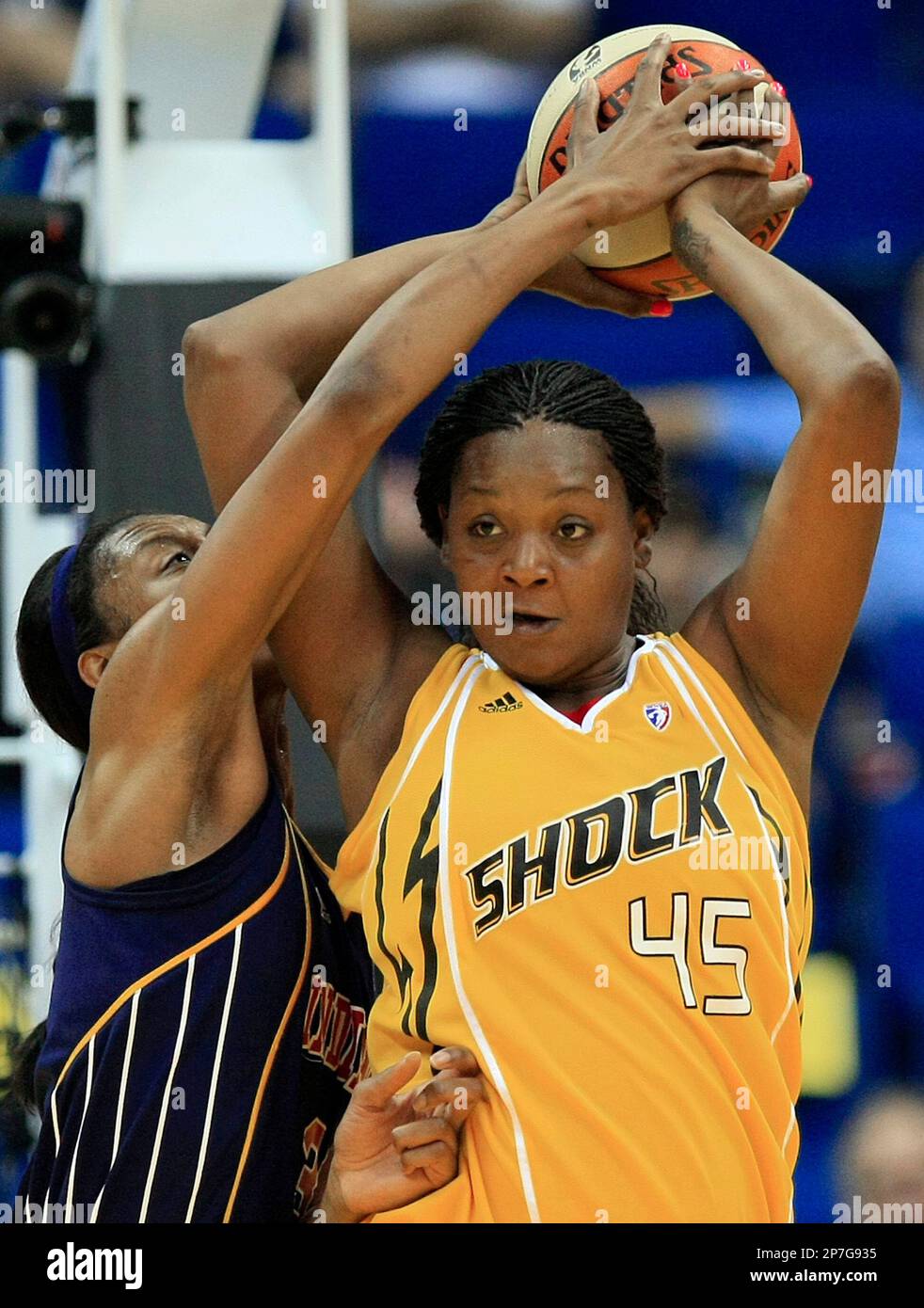 Tulsa Shock's Kara Braxton is harassed by Indiana Fever's Jessica Moore ...