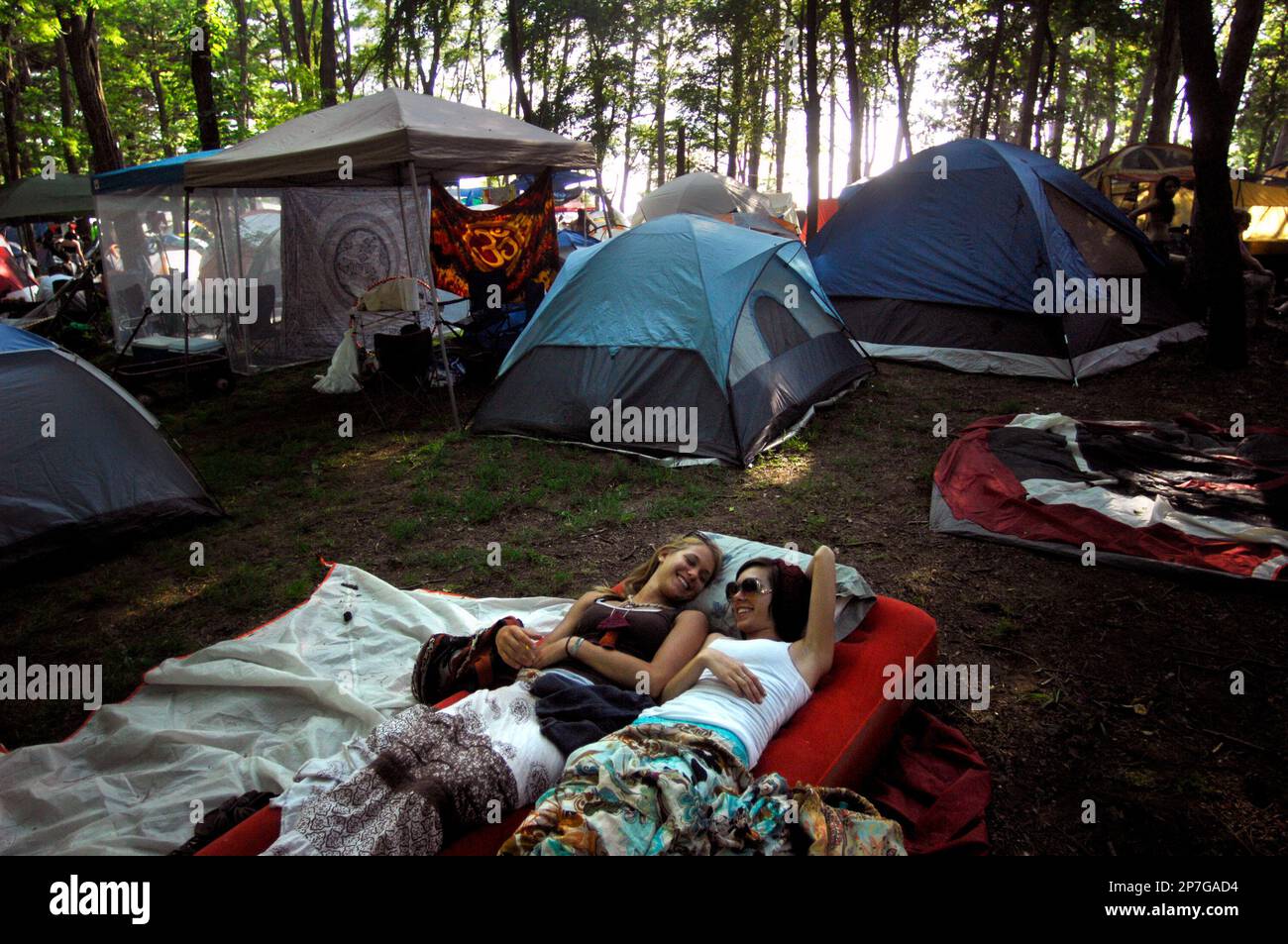 Ashley Miscevich, left, giggles with Danielle McDonough as they relax ...