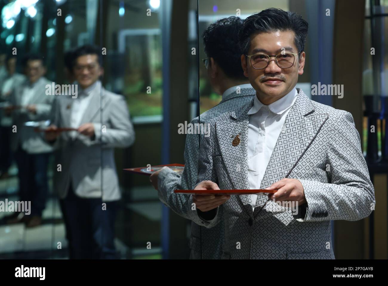 Feng Shui Master Yuen Yu-fu poses for a photo at Artyzen Club, China ...
