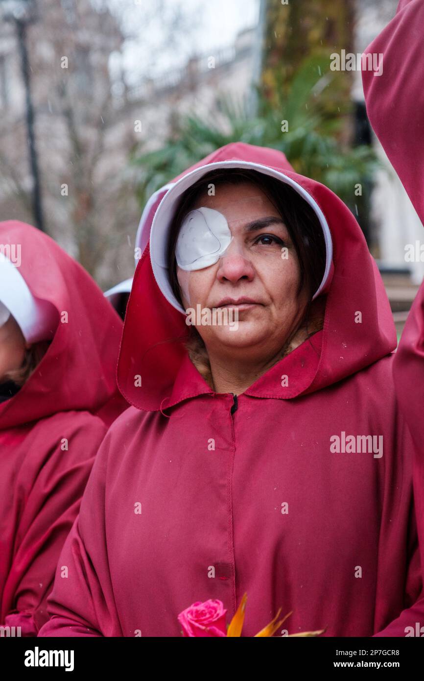 Iranian Handmaidens Protest during International Women's Day, showing ...