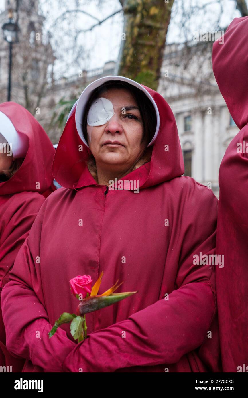 Iranian Handmaidens Protest during International Women's Day, showing ...