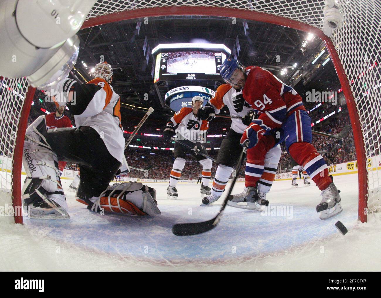 Philadelphia Flyers goalie Michael Leighton looks over his shoulder as ...