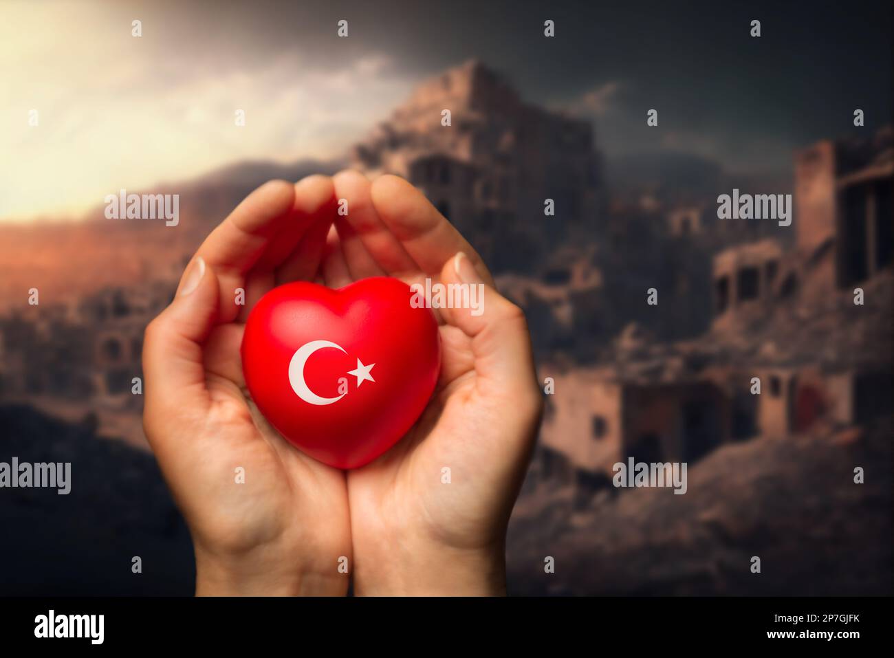 female hands hold and giving red heart in the form of a Turkey flag ...