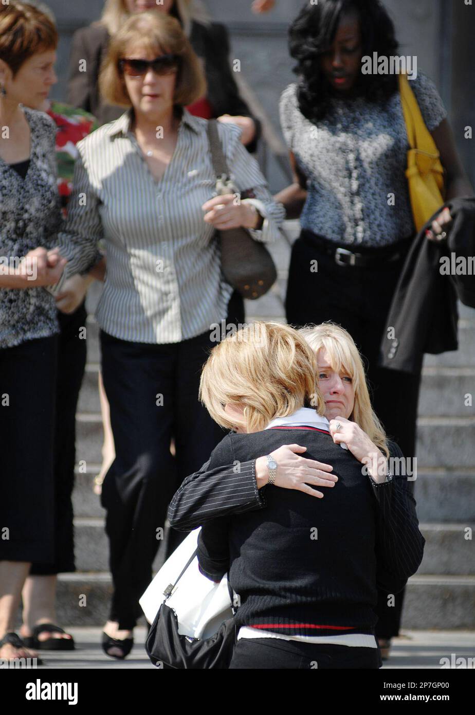Family and friends of Karen Irby react as they leave the Hinds County ...