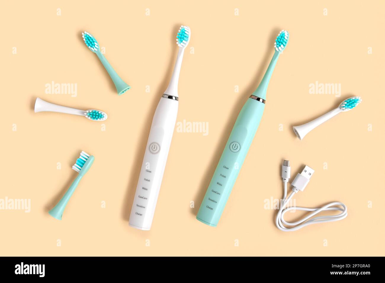 Toothbrushes on a beige neutral pastel color studio background. Top ...