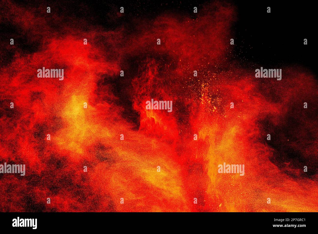 Red orange particles explosion on black background.Freeze motion of red ...