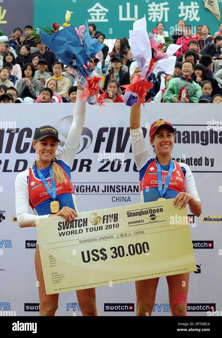 U.S.' Jennifer Kessy (L) and April Ross celebrate after winning the ...