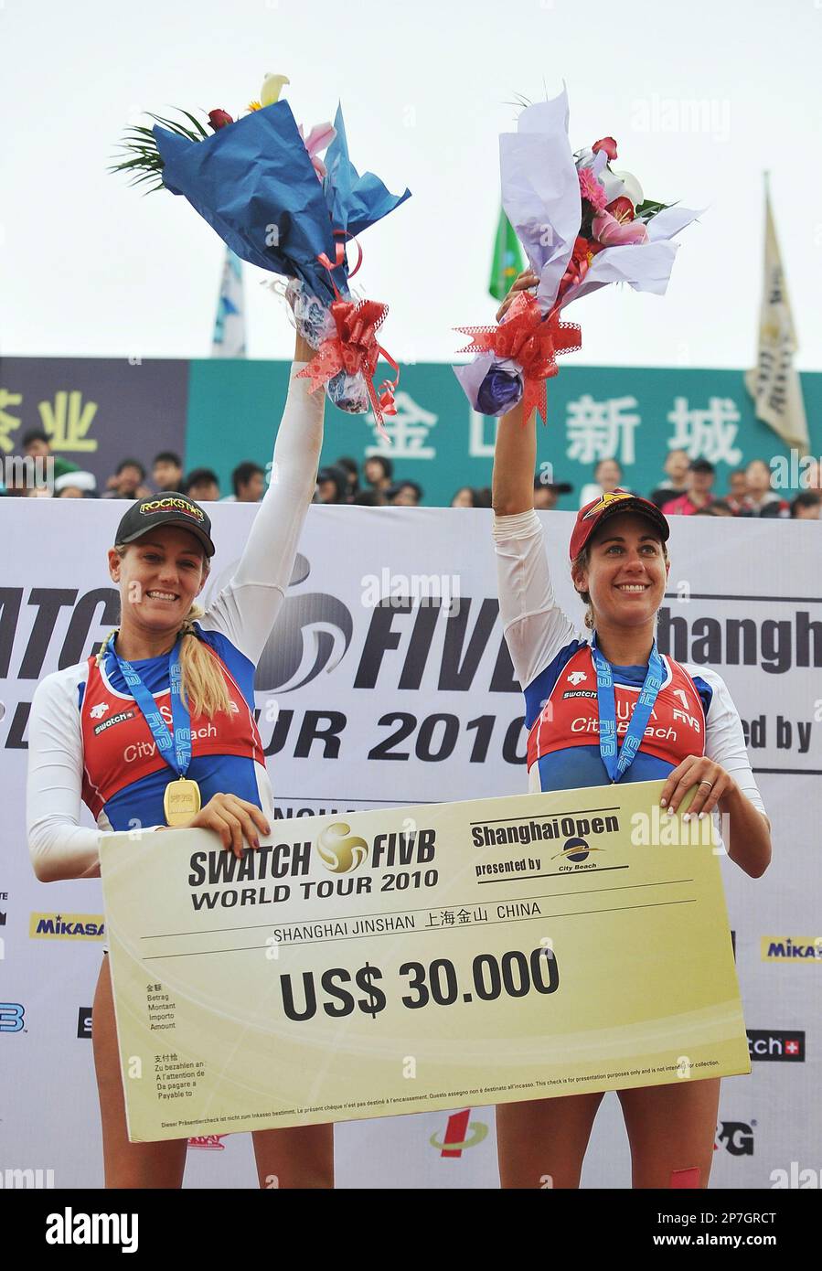 U.S.' Jennifer Kessy (L) and April Ross celebrate after winning the ...