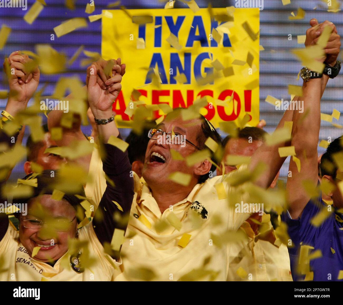 Confetti rains on presidential candidate Sen. Benigno "Noynoy" Aquino ...