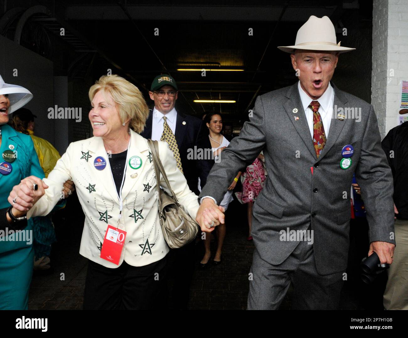 Super Saver owner Bill Casner and wife Susan celebrate after winning ...