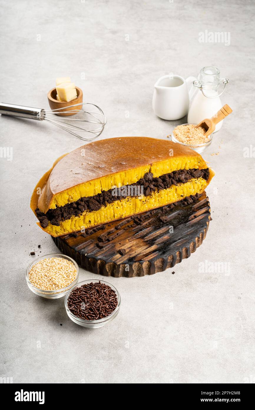 Martabak manis or terang bulan is indonesian sweet pancake, with yellow ...