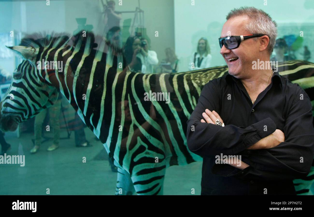 British artist Damien Hirst poses in front of his work 'The Incredible ...