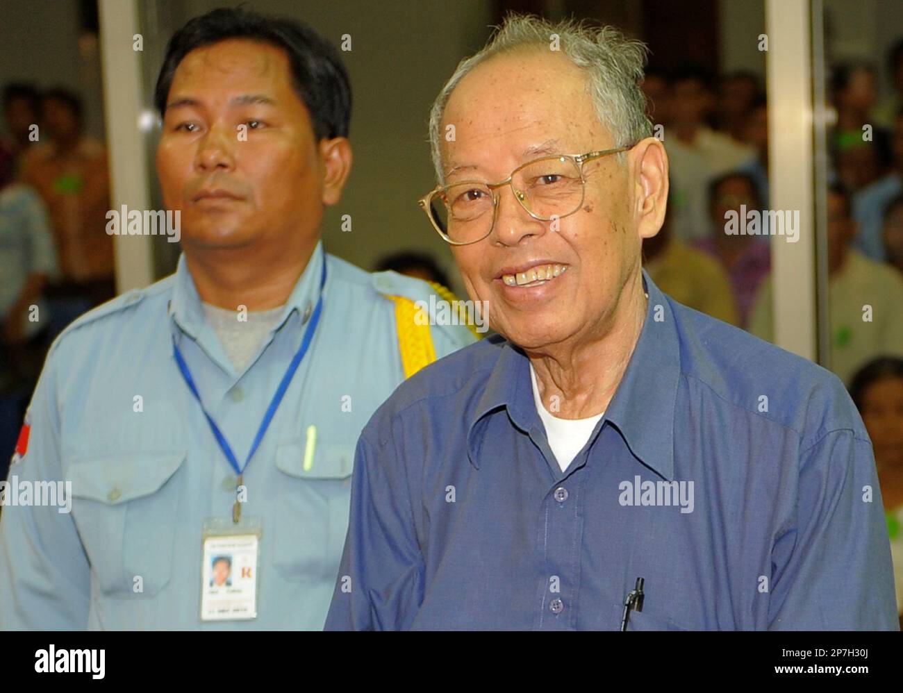 Ieng Sary, right, former Khmer Rouge's foreign affair minister, appears ...