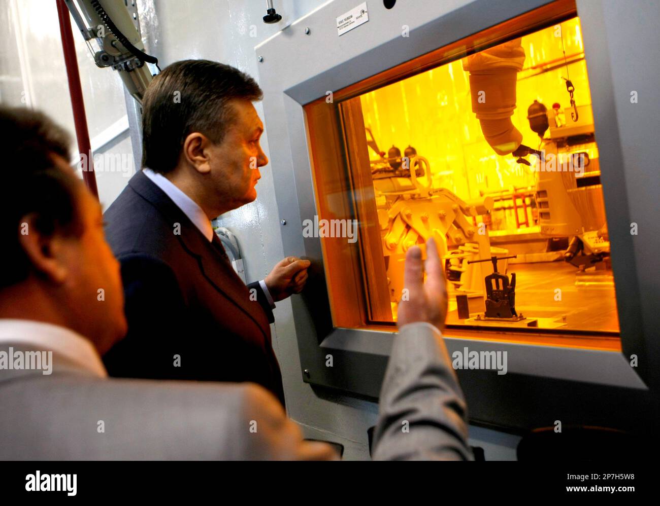 Ukrainian President Viktor Yanukovych, second from left, visits a ...
