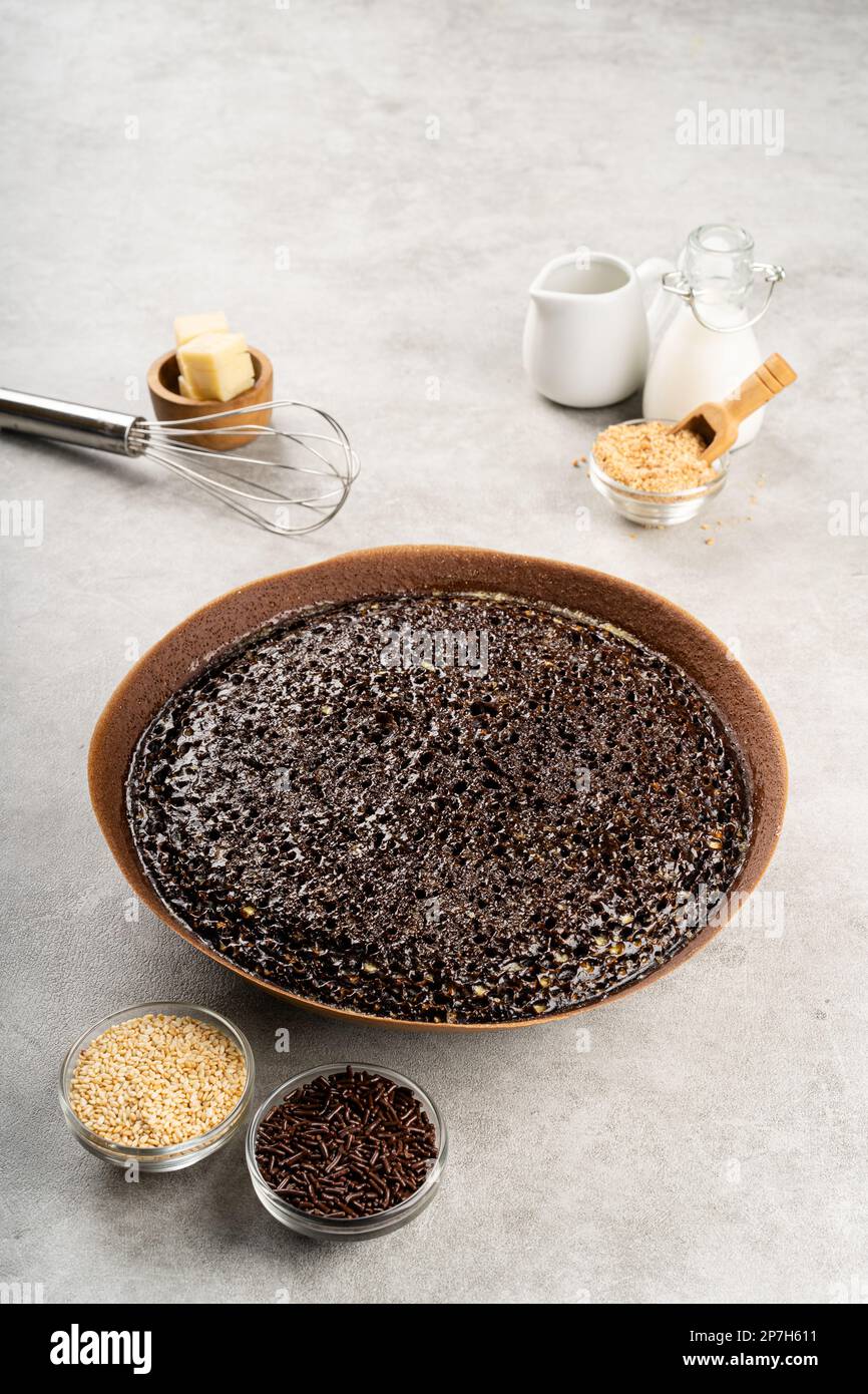 Martabak manis or terang bulan is indonesian sweet pancake, with brown ...