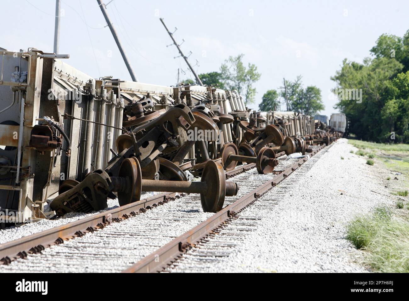 The wheels of railroad cars clutter the tracks after the train was ...