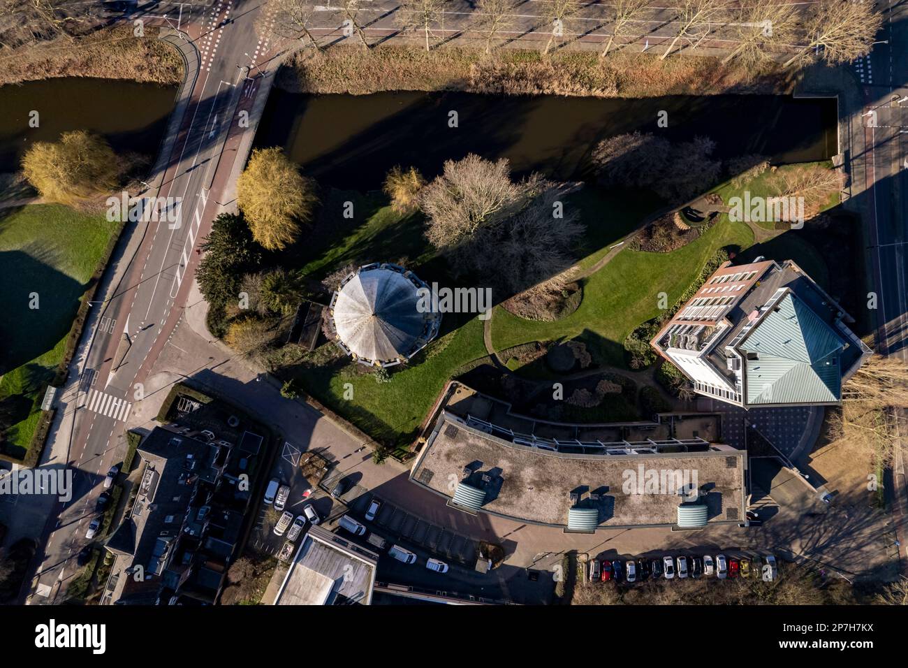 Top down urban aerial around former Dutch brick water tower in Zutphen ...