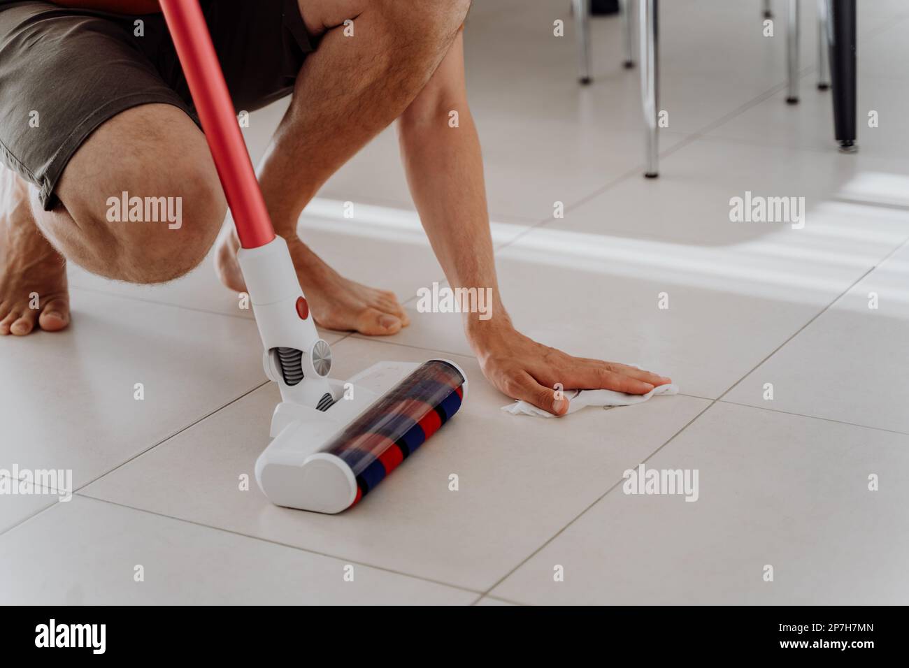 Vacuuming tiled floor close up hi-res stock photography and images - Alamy