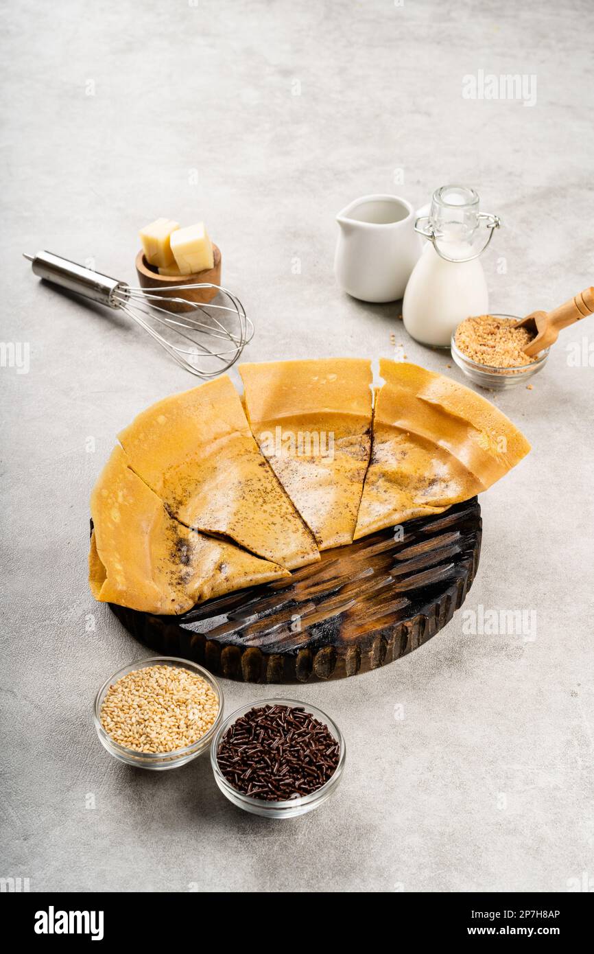 Martabak manis or terang bulan is indonesian sweet pancake filled with ...