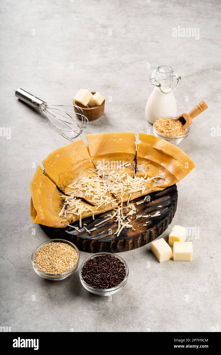Martabak manis or terang bulan is indonesian sweet pancake filled with ...