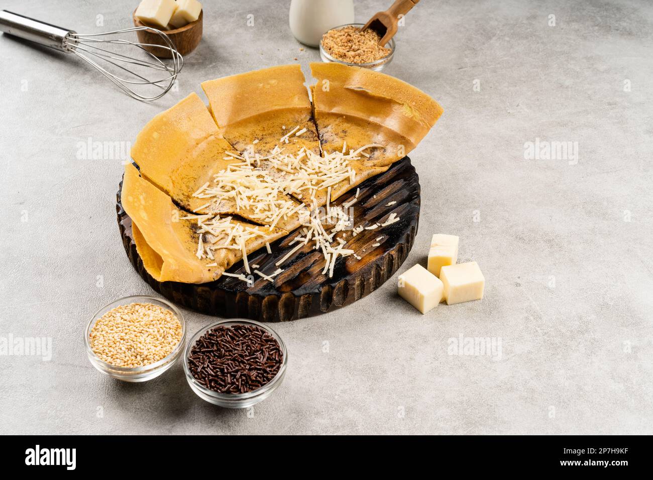 Martabak manis or terang bulan is indonesian sweet pancake filled with ...