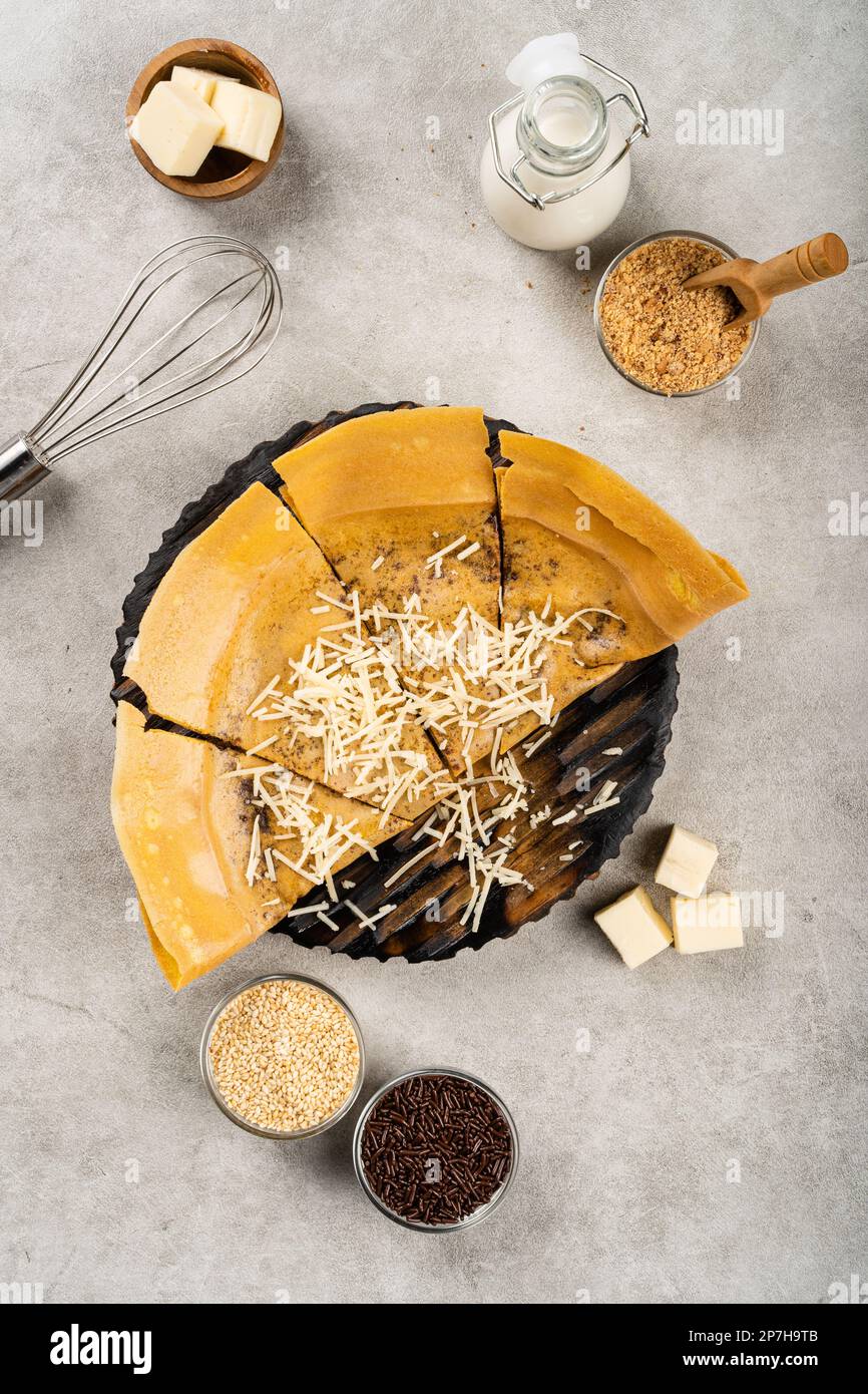 Martabak manis or terang bulan is indonesian sweet pancake filled with ...
