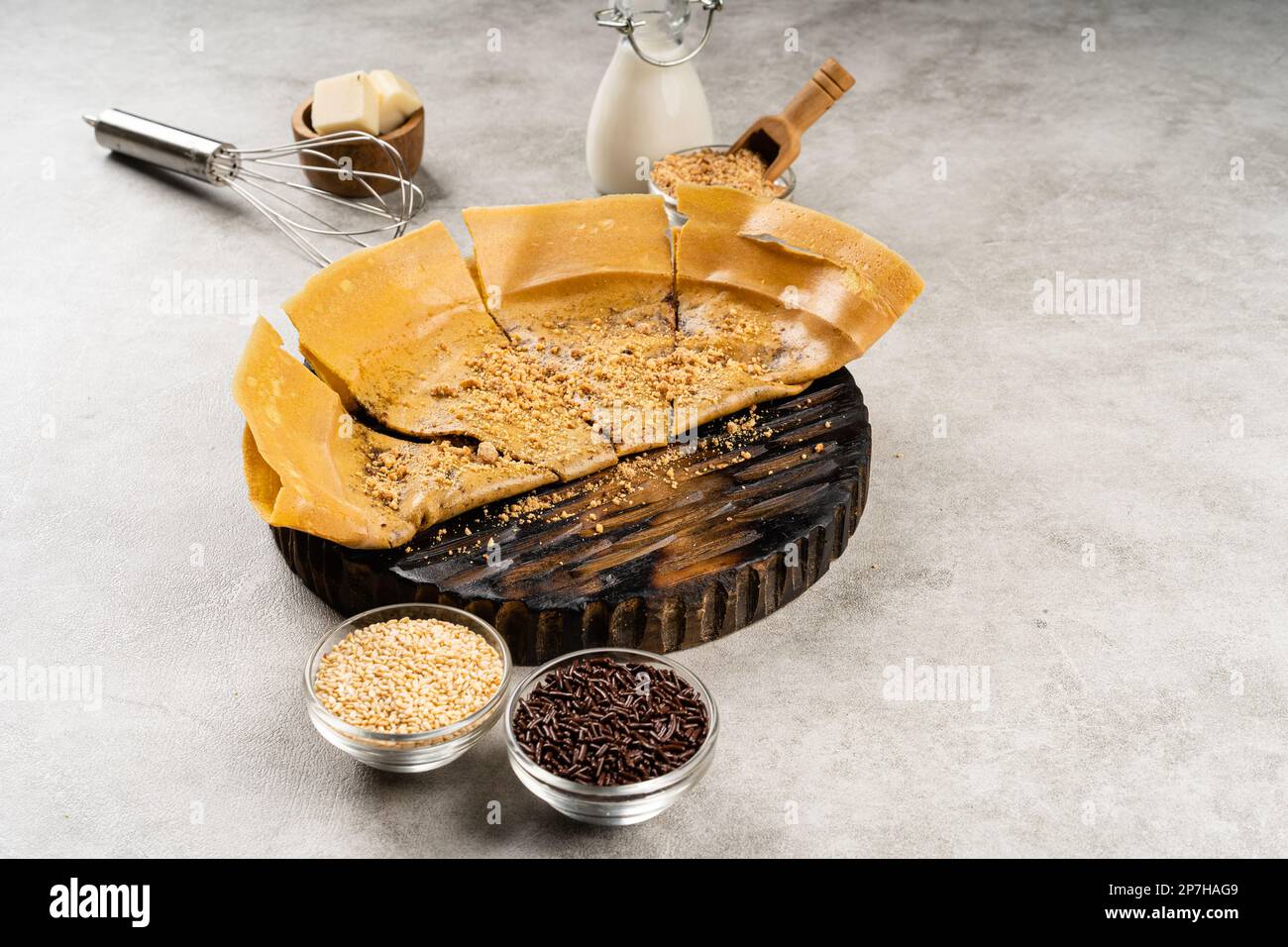 Martabak manis or terang bulan is indonesian sweet pancake filled with ...