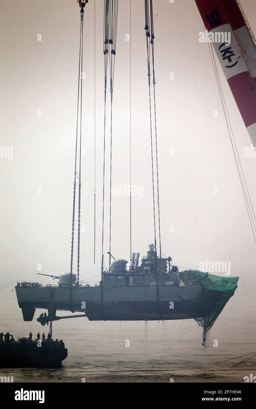 A giant offshore crane salvages portion of the sunken South Korean ...