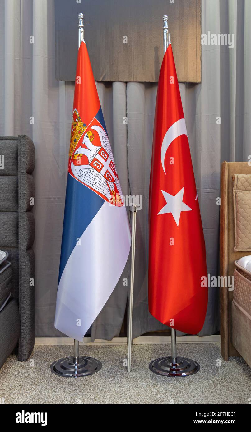 Serbian and Turkish Flags at Poles in Conference Room Stock Photo - Alamy