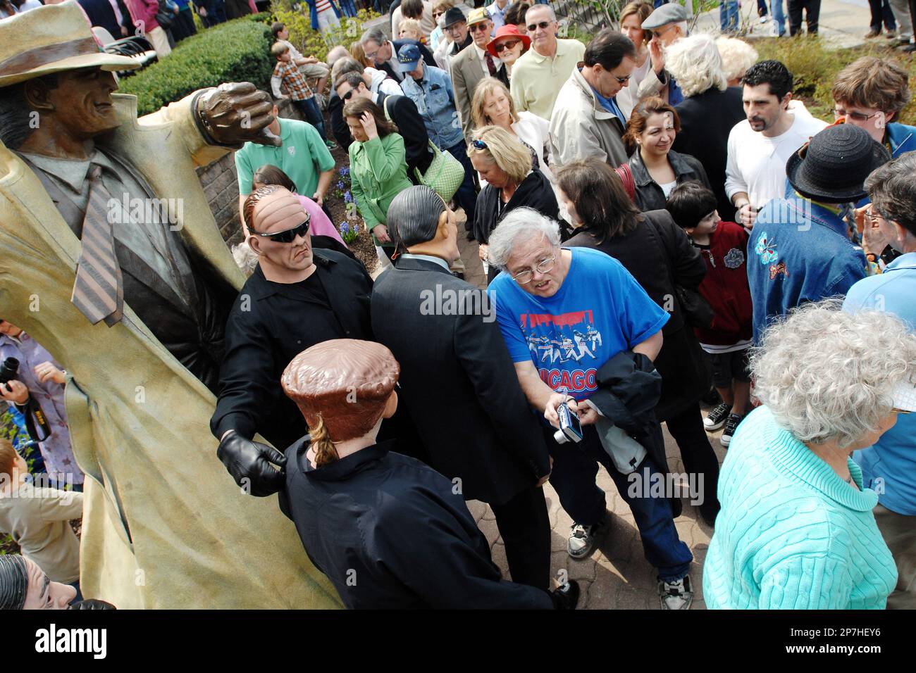In this photo taken Sunday, April 11, 2010, visitors to the Naperville ...