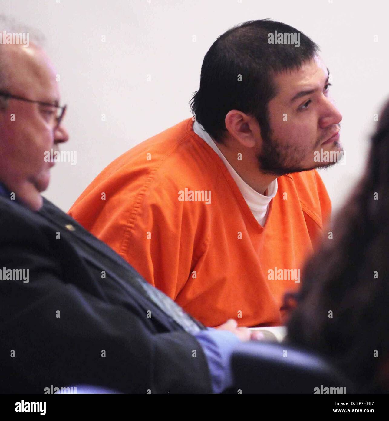 Joe Galvan and his lawyer John Livesay, left, listen to a witness ...