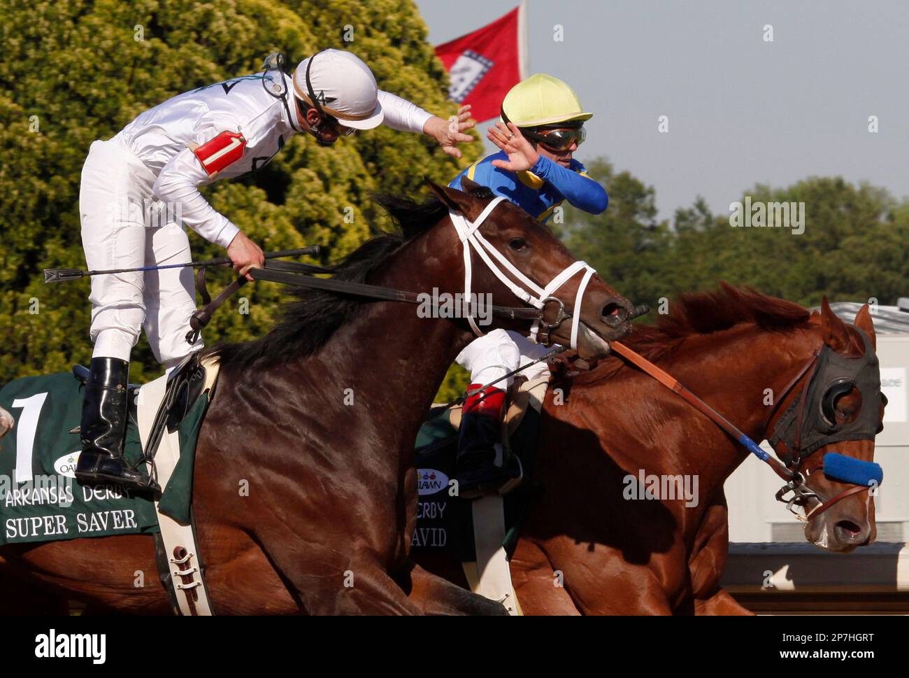 Jockey Calvin Borel (1) aboard Super Saver congratulates jockey Jon ...