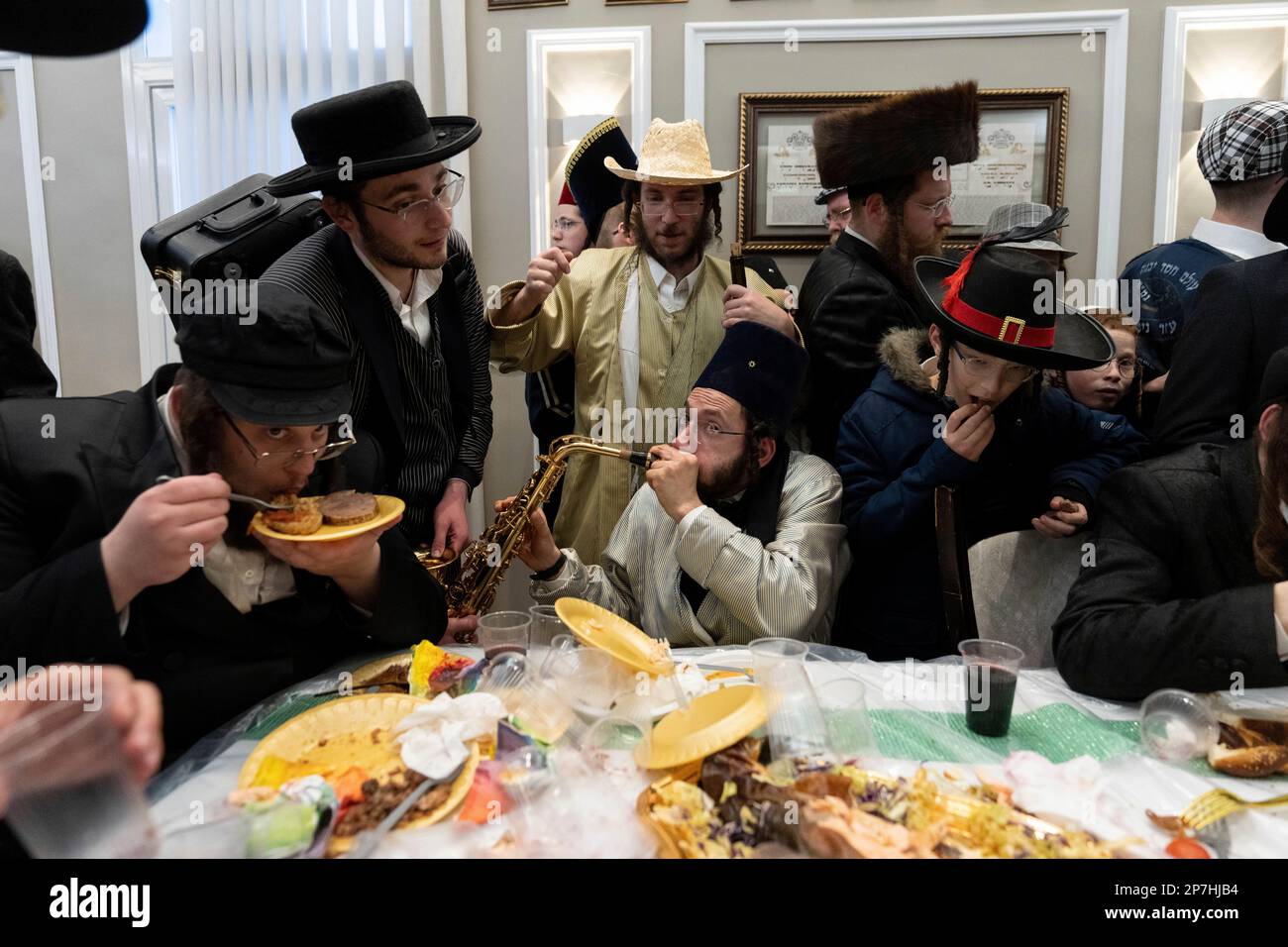 Ultra-Orthodox Jewish men and children some in costumes celebrate the ...