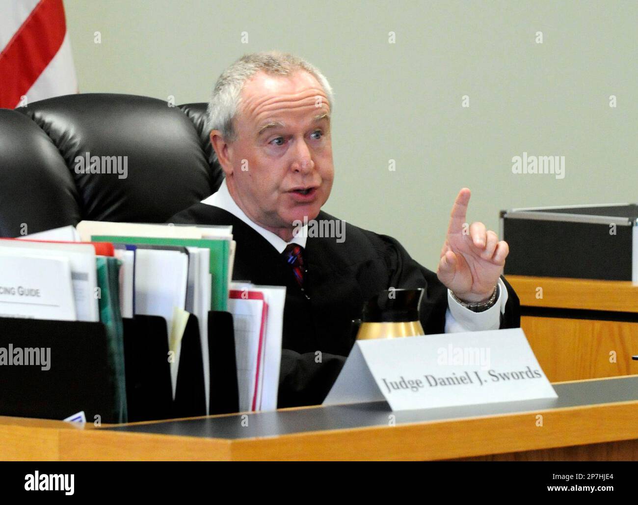 Judge Daniel J. Swords presides during the arraignment of three teenage ...