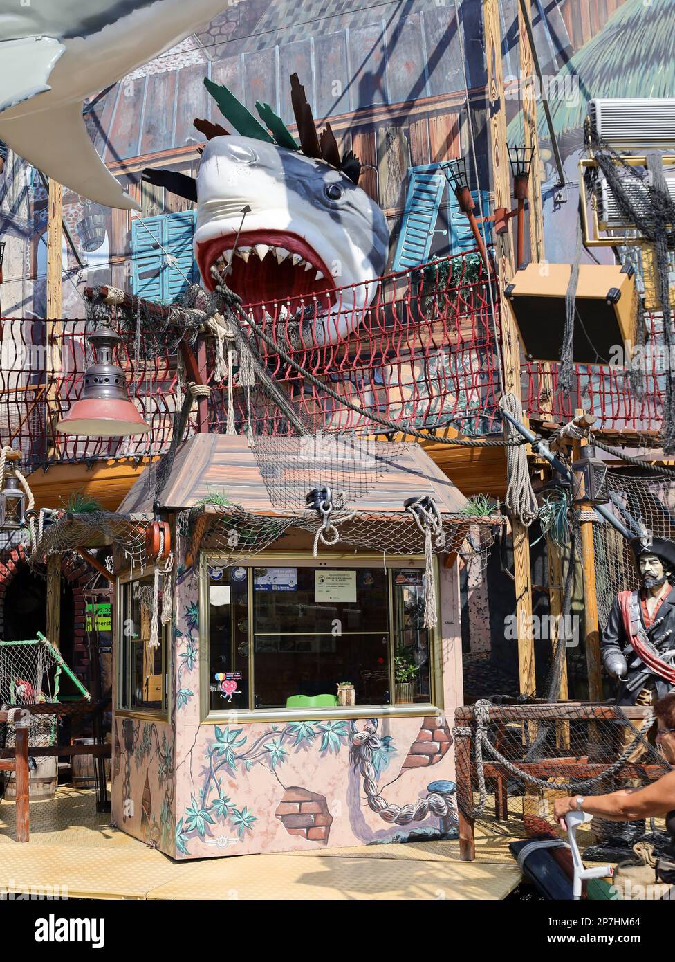 colorful booths and fun rides at a fairground Stock Photo - Alamy
