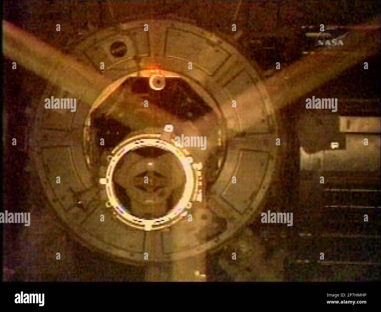 This TV image provided by NASA shows the pressurized mating adapter ...