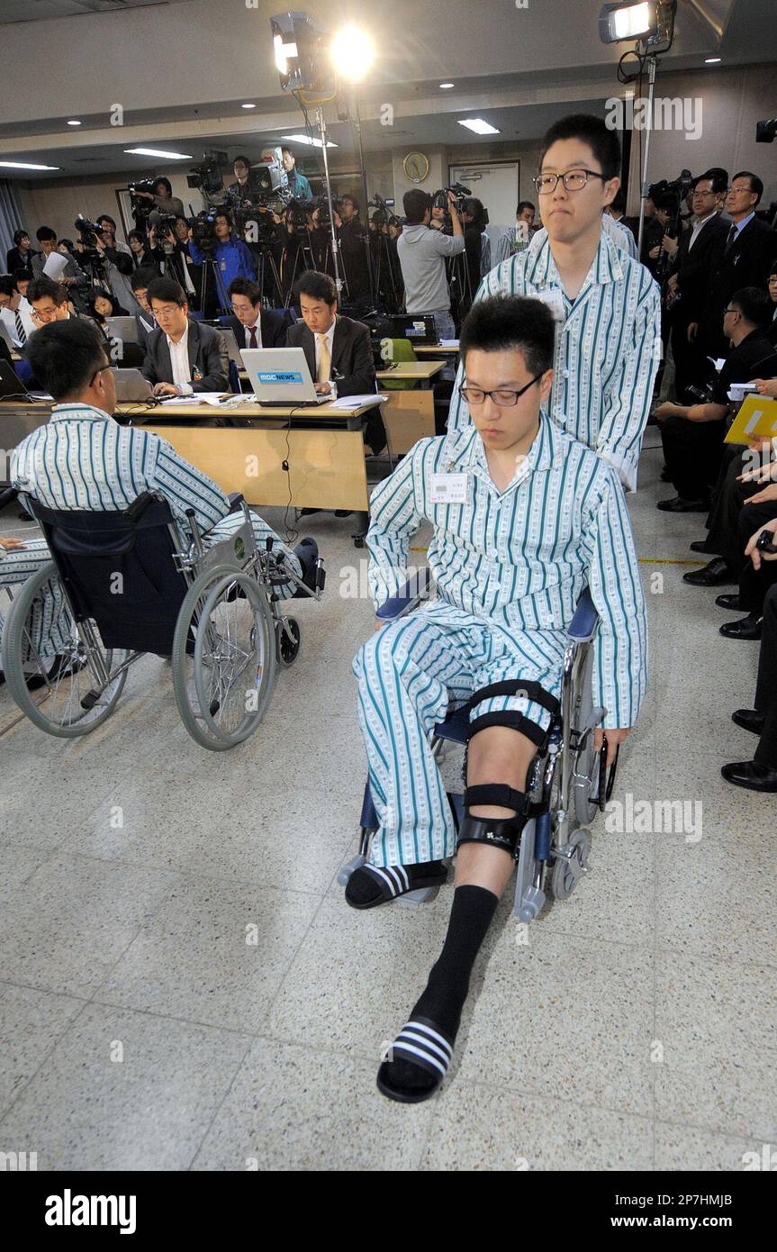 Survivors of the sunken South Korean warship Cheonan arrive to attend a ...