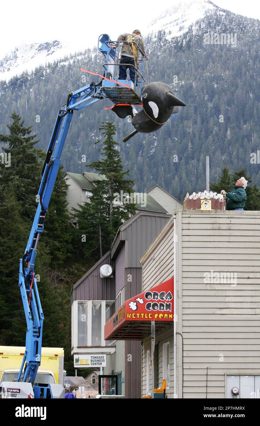 In this April 5, 2010 photo Tony Mataffari looks up from the roof where ...