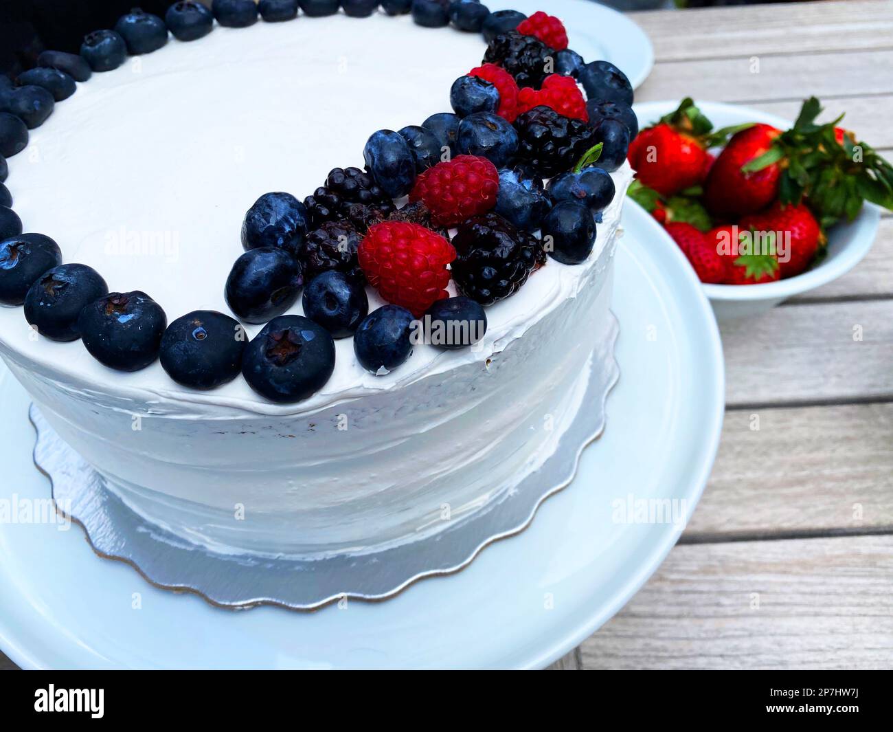 Frosted cake with strawberries hi-res stock photography and images - Alamy