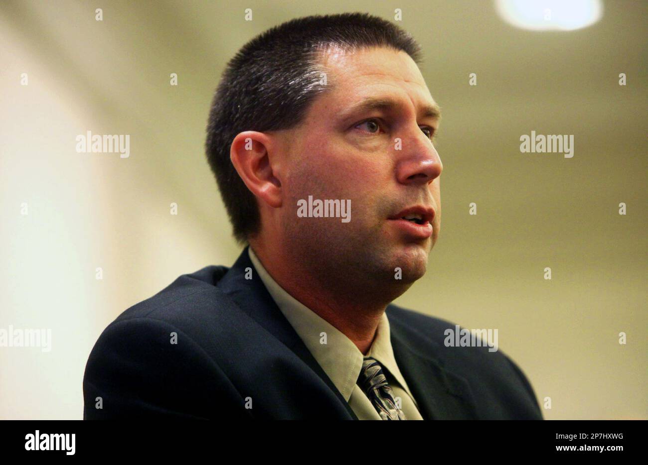 Wesley Earnest answers questions on the stand during his murder trial ...