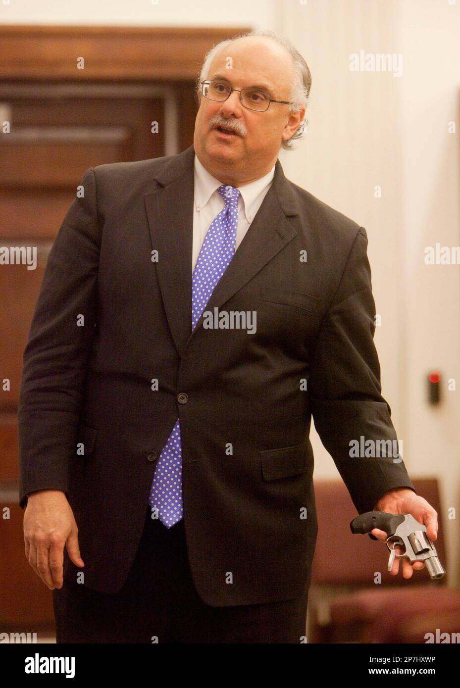 Defense Attorney Joseph Sanzone holds the gun that killed Jocelyn ...