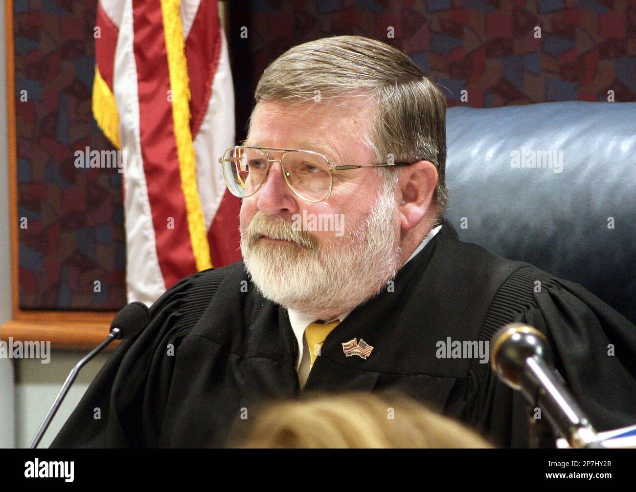 Judge Stanley T. Fugar Jr. listens during a hearing for Ronald Taylor ...