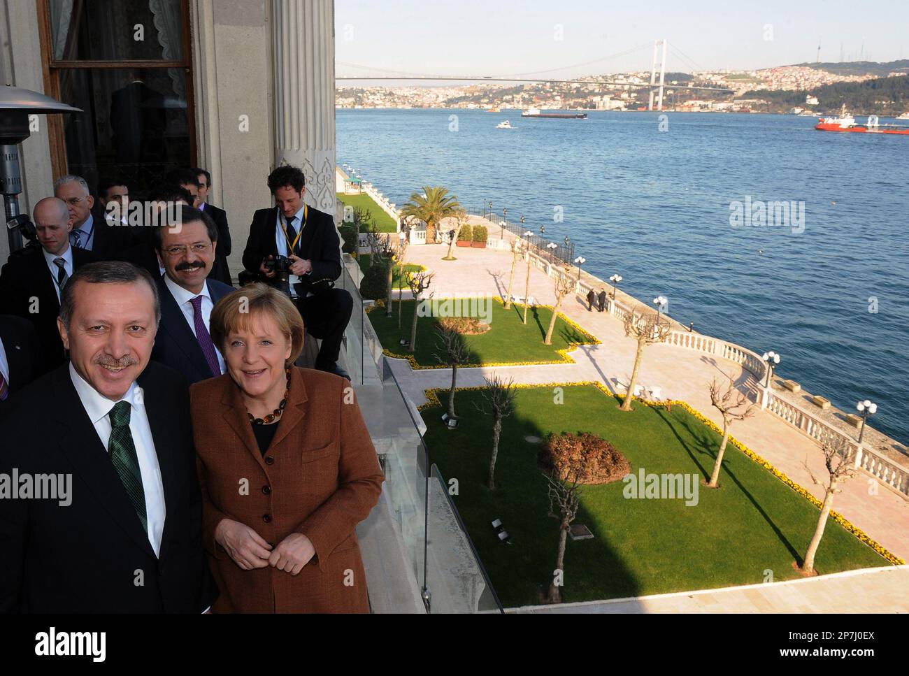 German Chancellor Angela Merkel, right, and Turkish Prime Minister ...