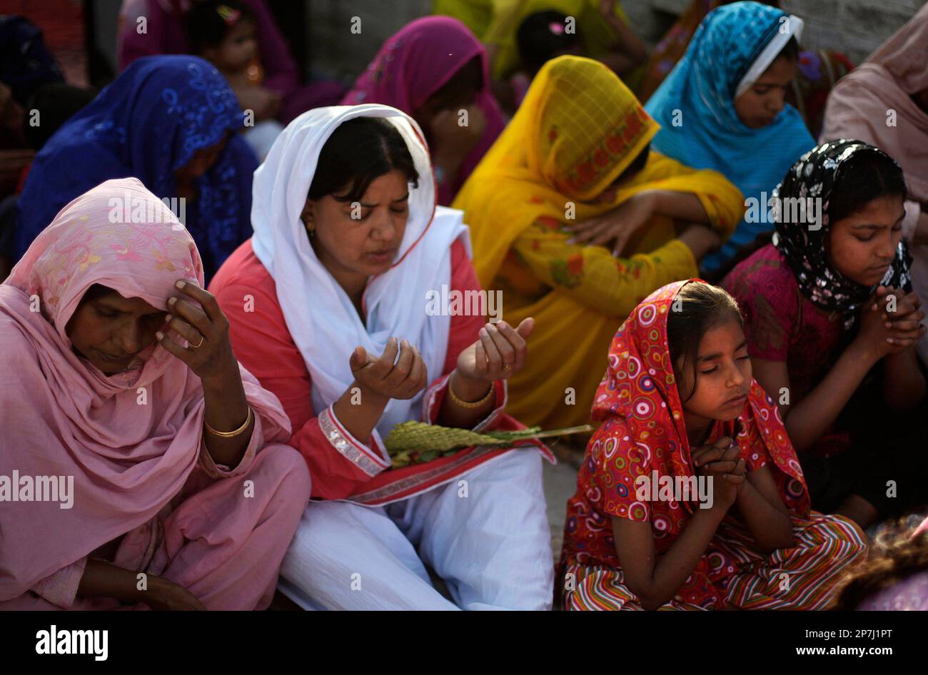 Pakistani Christians pray during a ceremony to celebrate Orthodox Palm ...