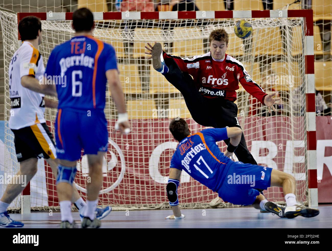 Koldings goalkeeper Ole Erevik, top right, in action during the men's ...