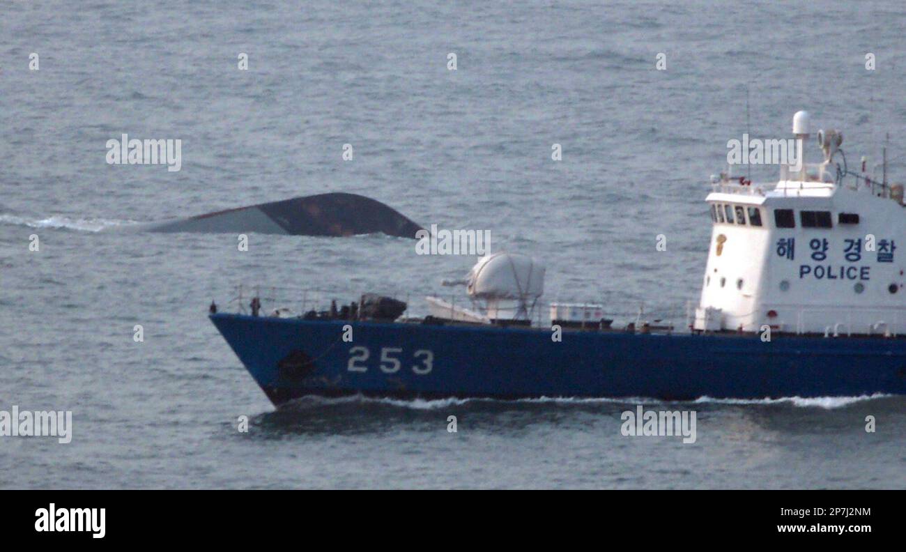 A South Korean naval ship, the Cheonan, sinks as a coast guard vessel ...